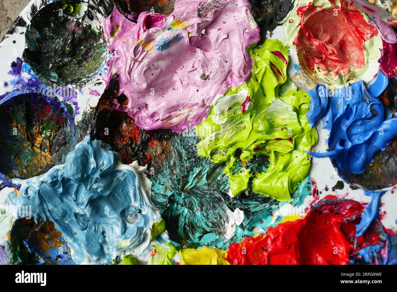 Colors oil painting on palette for Background Stock Photo - Alamy