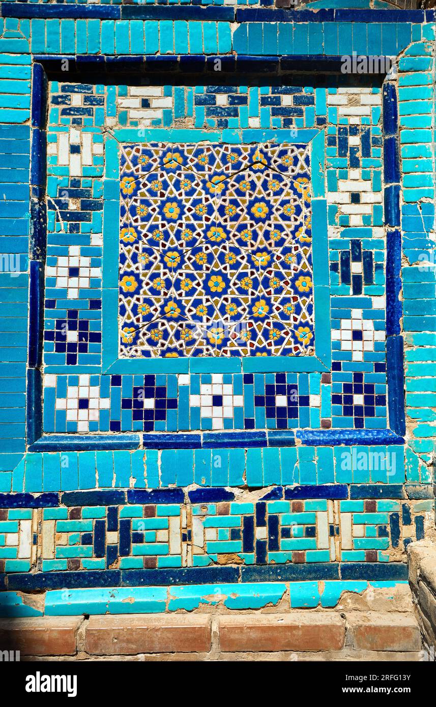 Mosaic on the wall of beautiful Historical cemetery of Shahi Zinda with ...
