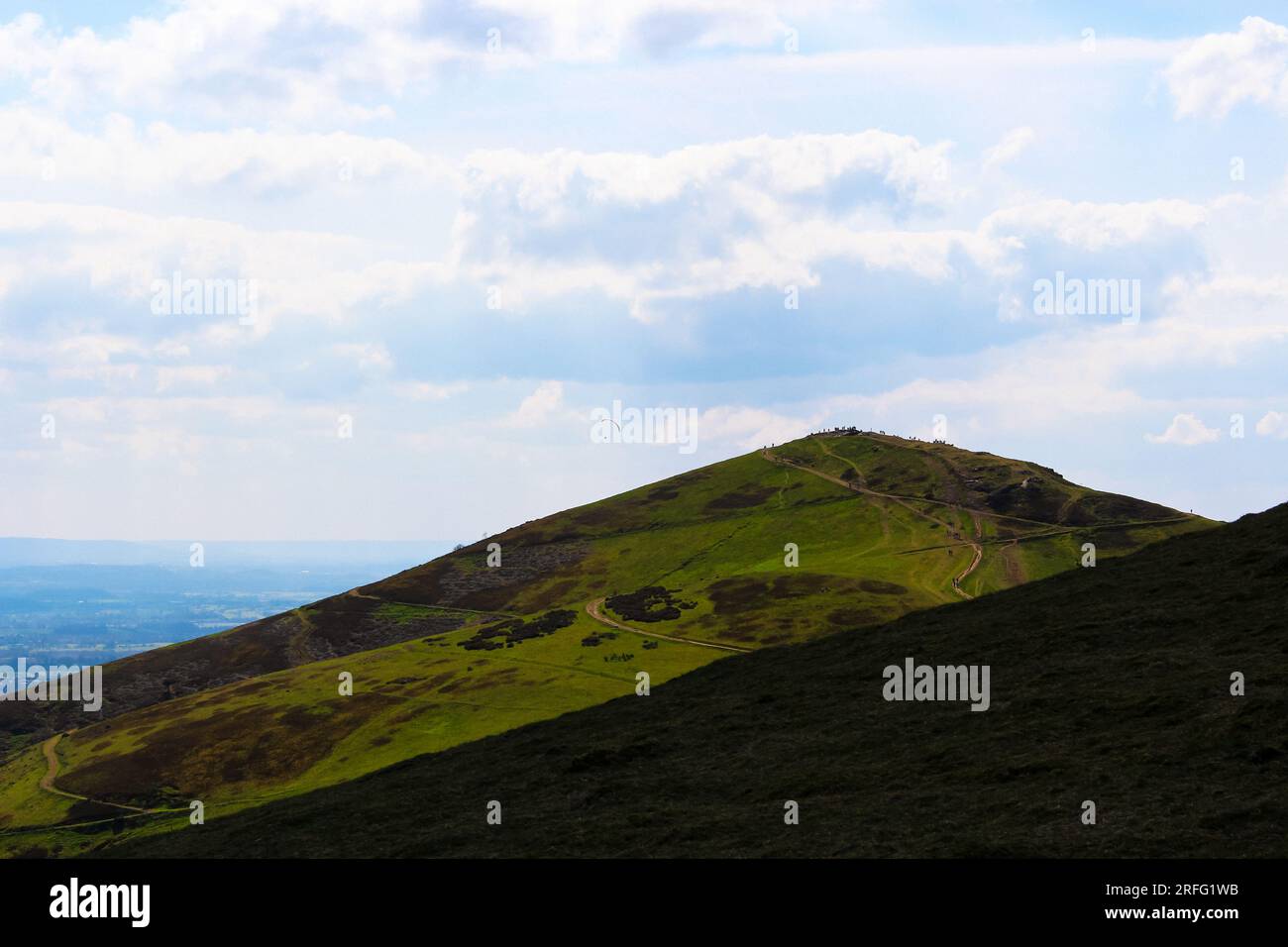 Sun over hill Stock Photo - Alamy