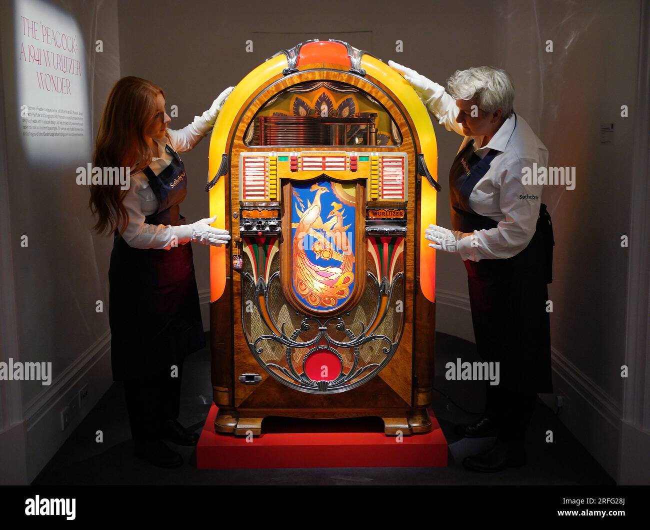 A multicoloured, illuminated Wurlitzer jukebox, 1941, with an estimate ...