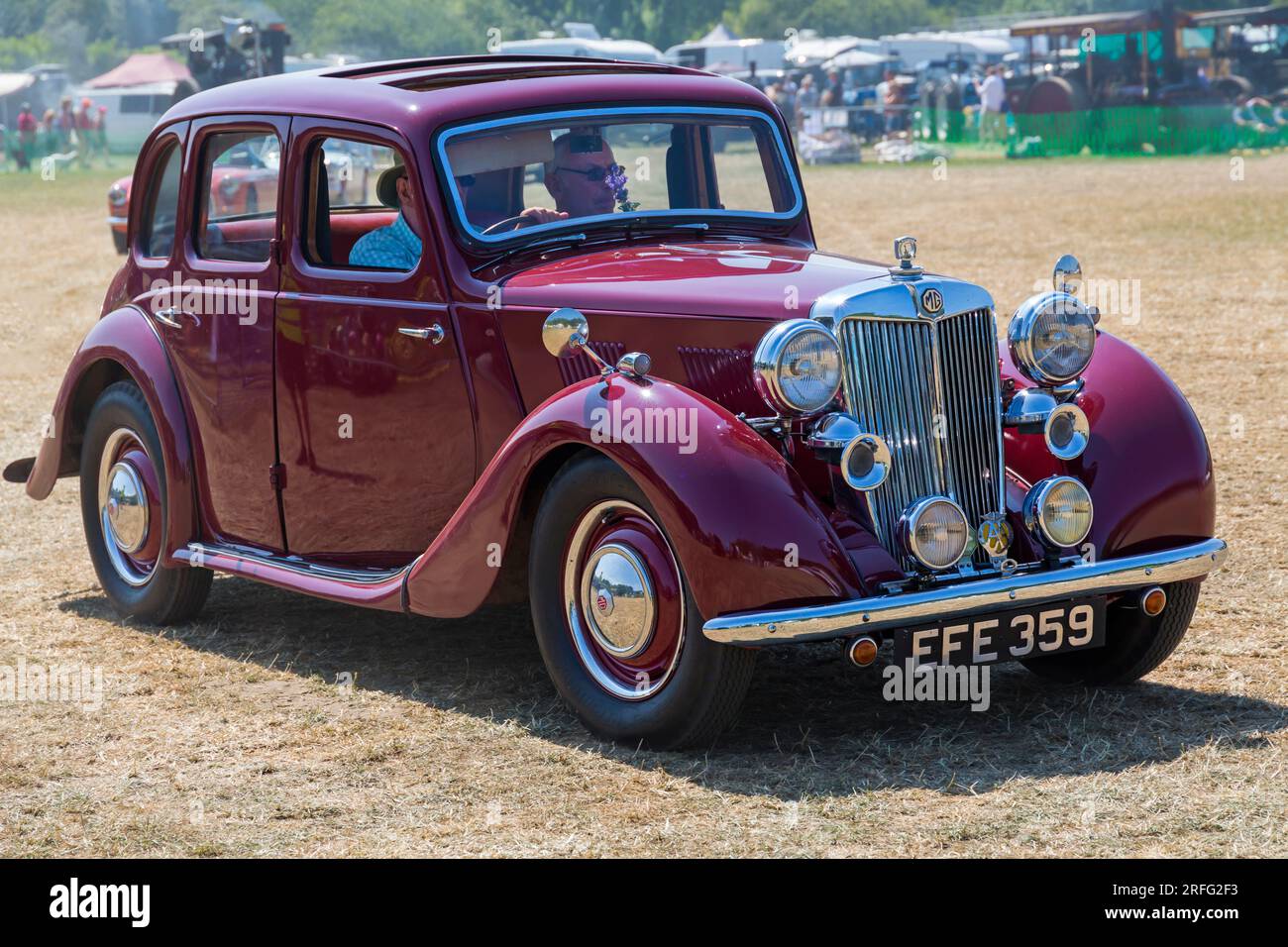 Man driving Red 1950 MG YB car on display at Roads to Rail Steam Rally ...