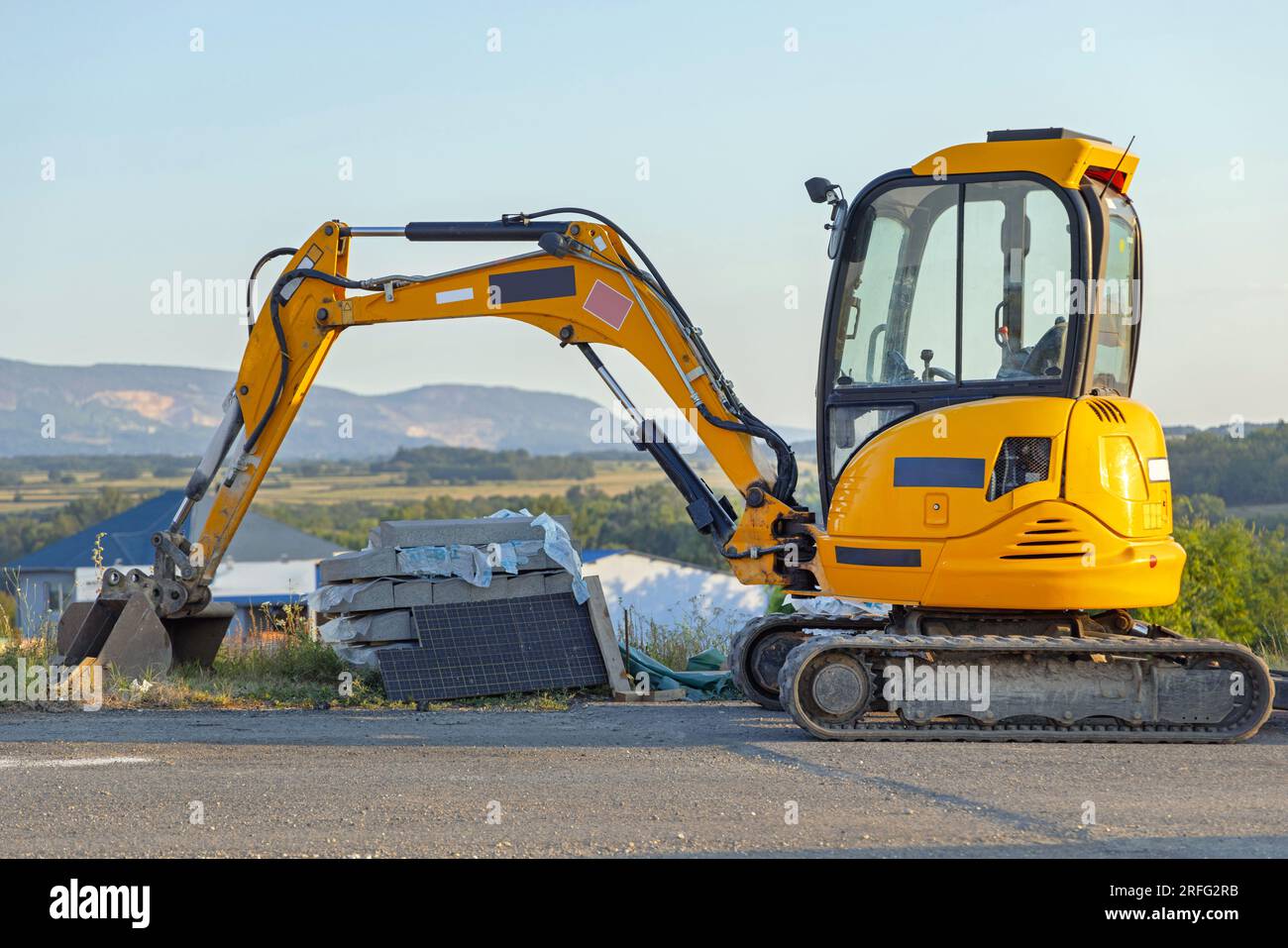 Mini Excavator Machine at Highway Construction Site Stock Photo - Alamy