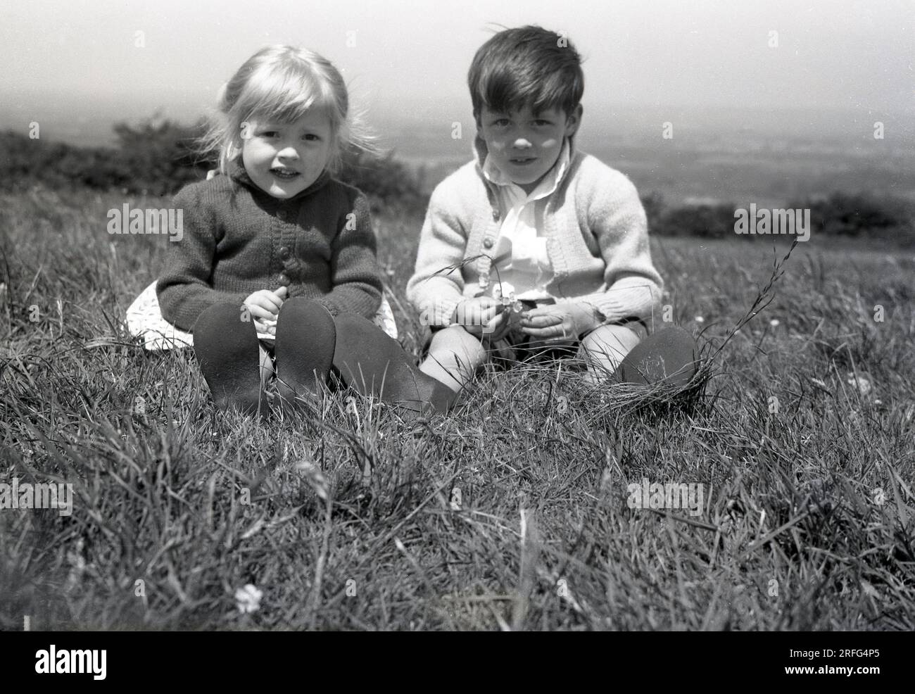 1950s, historical, summertime and two young children, brother and ...