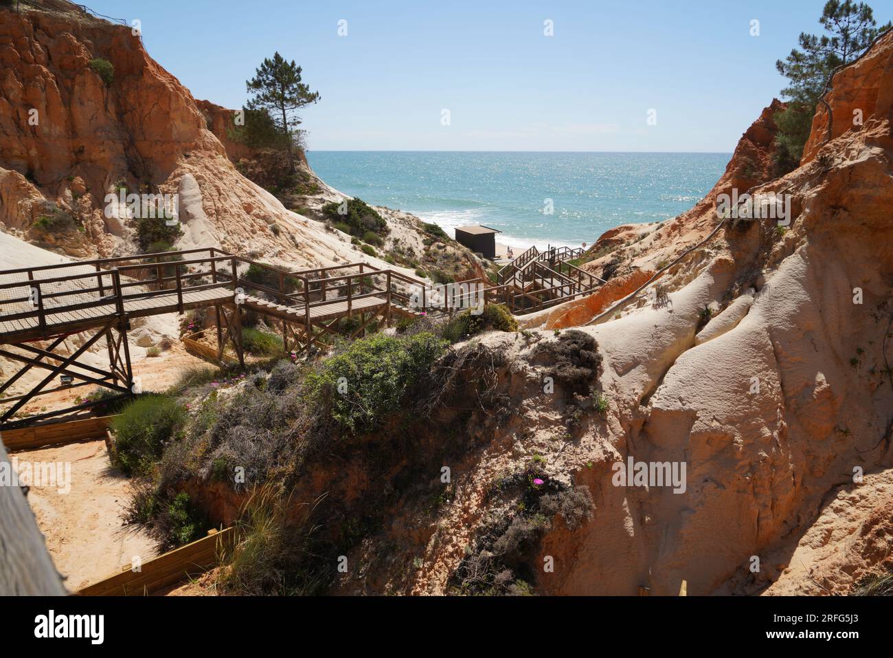 Beach in Algarve in Portugal with blue sea and sky at the rock Algarve ...