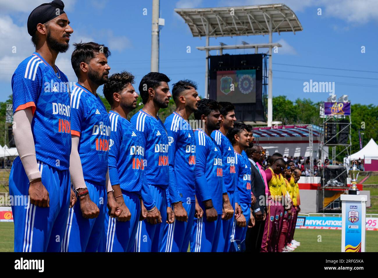 Players of India's cricket team line up during the anthems ceremony ...