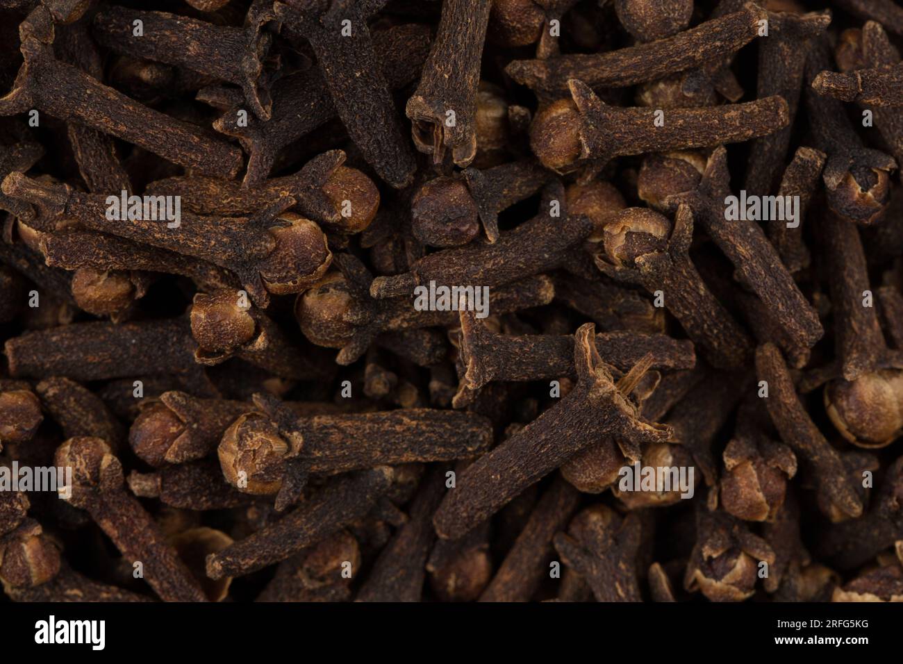 Cloves spice close up as a background Stock Photo - Alamy