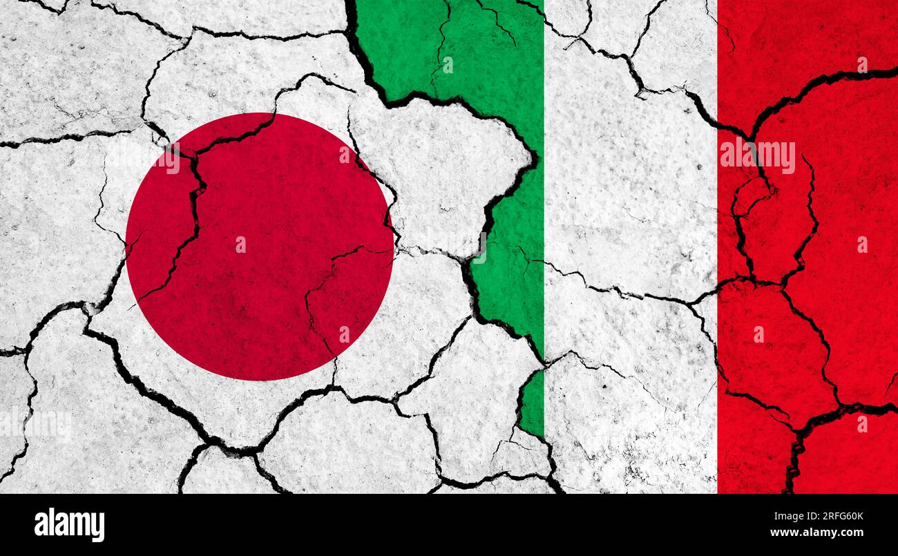 Flags of Japan and Italy on cracked surface - politics, relationship ...