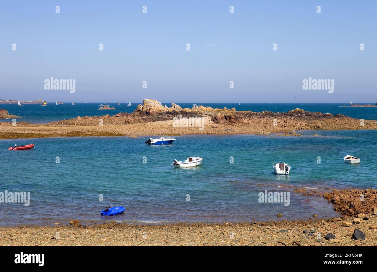 Stranded boats at low tide in the harbour near Roscoff. Brittany ...