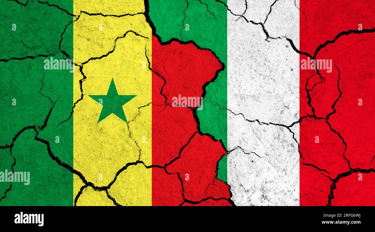 Flags of Senegal and Italy on cracked surface - politics, relationship ...