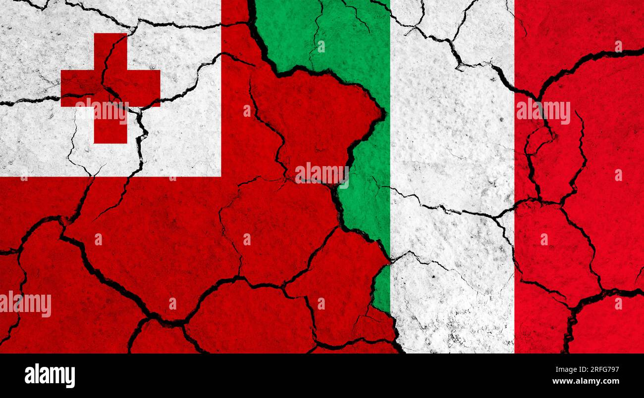 Flags of Tonga and Italy on cracked surface - politics, relationship ...