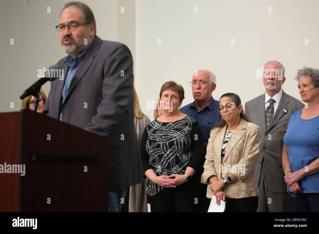 Howard Fienberg, a son of Joyce Fienberg, speaks to the media, along ...