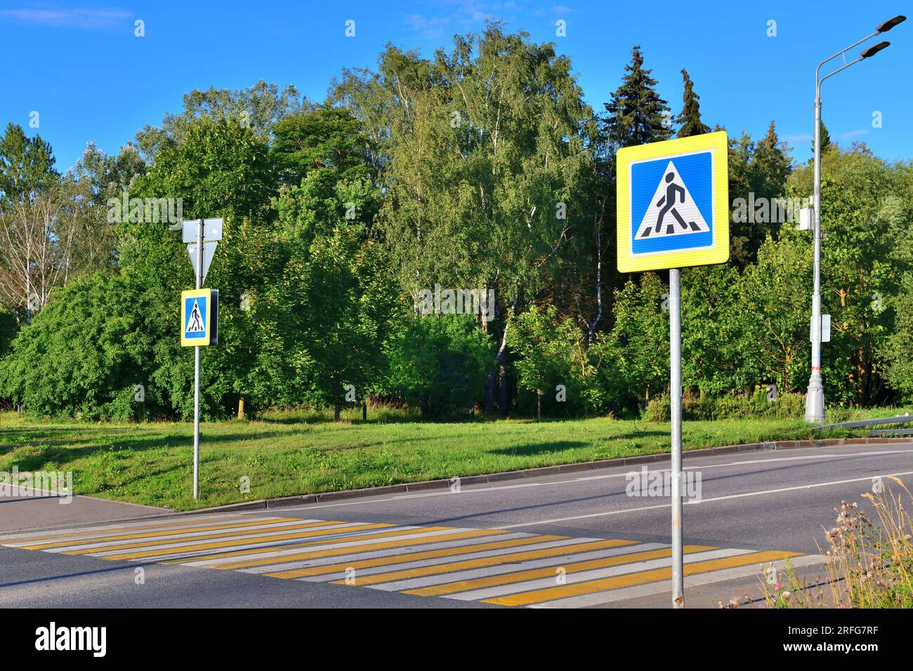 Pedestrian crossing with markings and signs on country road Stock Photo ...