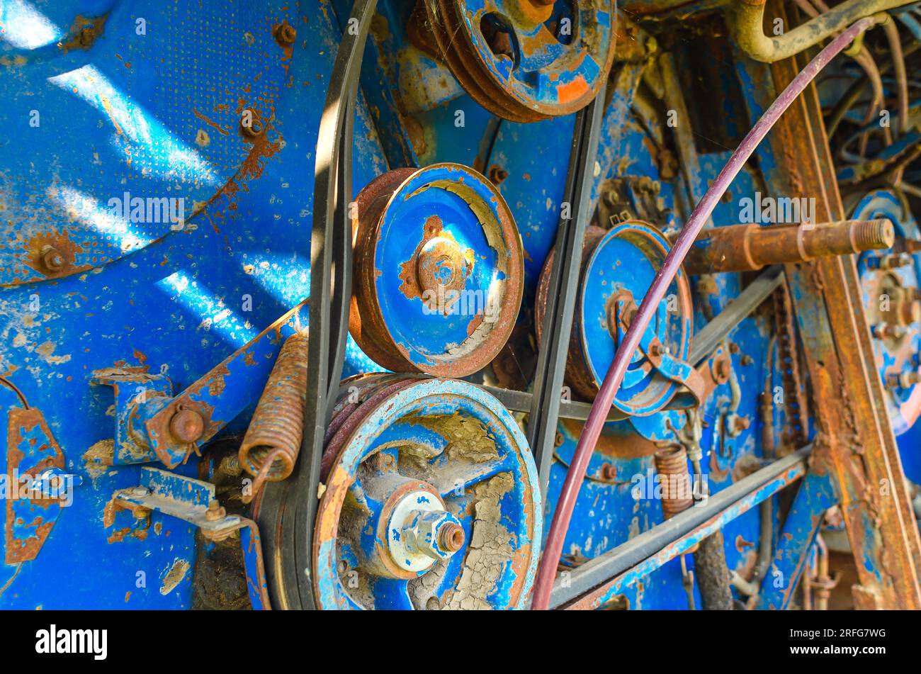 Belt drives of an old broken engine in an agricultural combine Stock ...