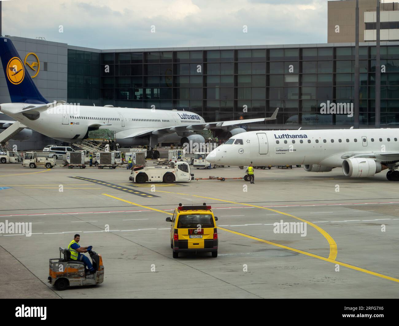 Frankfurt, Germany - June 7, 2023 - a Lufthansa A330-343 and an Embraer ...