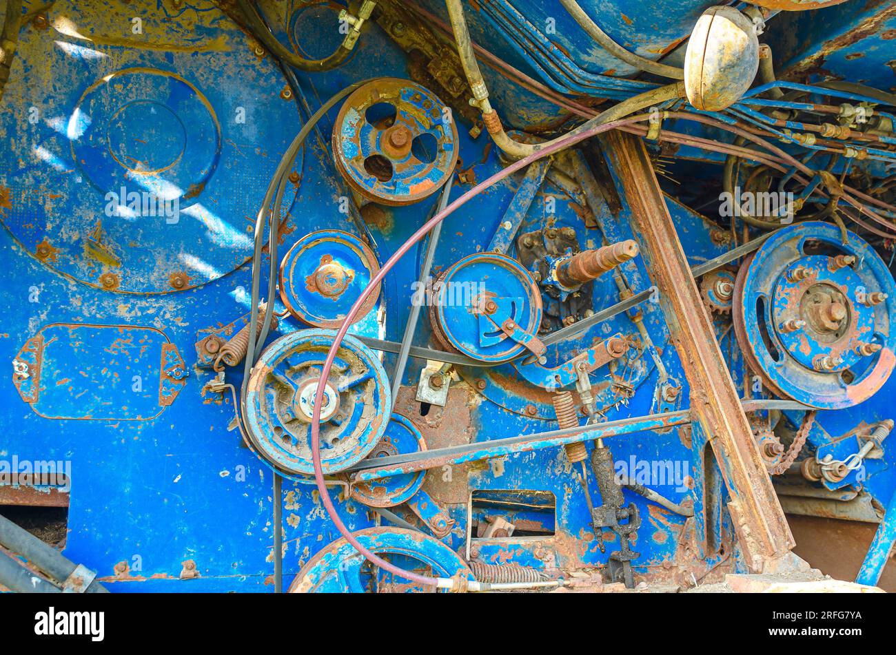 Belt drives of an old broken engine in an agricultural combine Stock ...