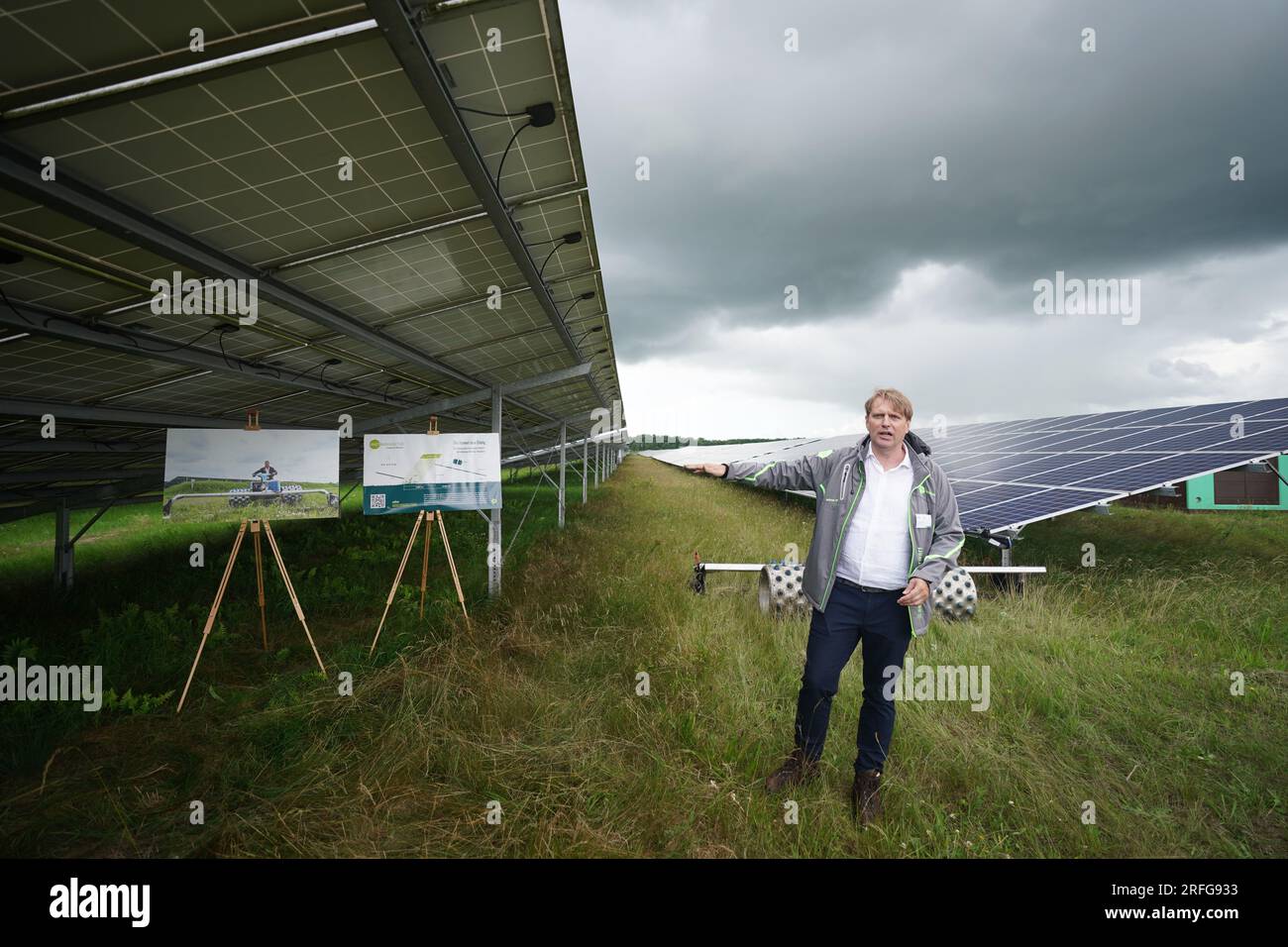 Klein Rheide, Germany. 03rd Aug, 2023. René Nissen, solar park operator ...