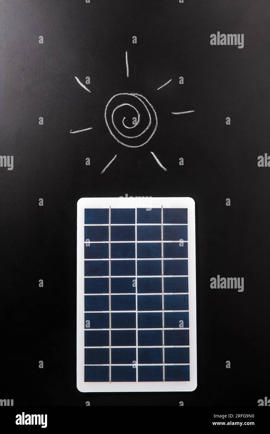 close up of solar battery and sun on chalkboard Stock Photo - Alamy