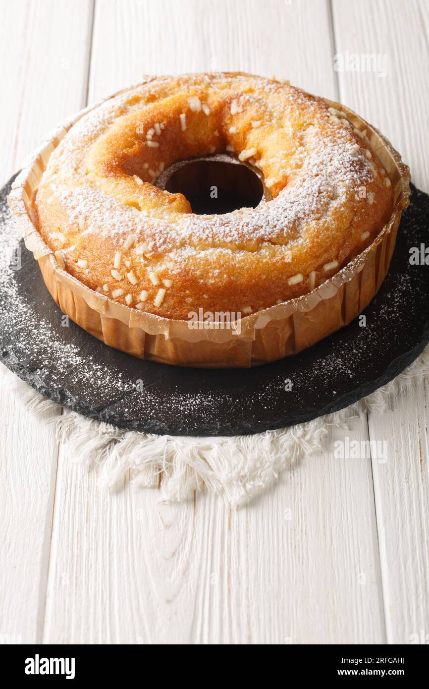 Ciambella is an Italian ring shaped cake with granulated sugar closeup ...