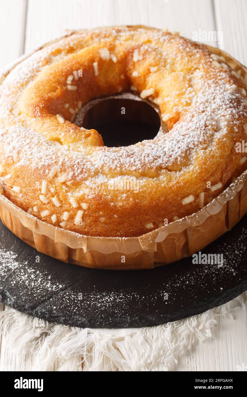 Homemade Bundt cake Italian Ciambella closeup on the table. Vertical ...