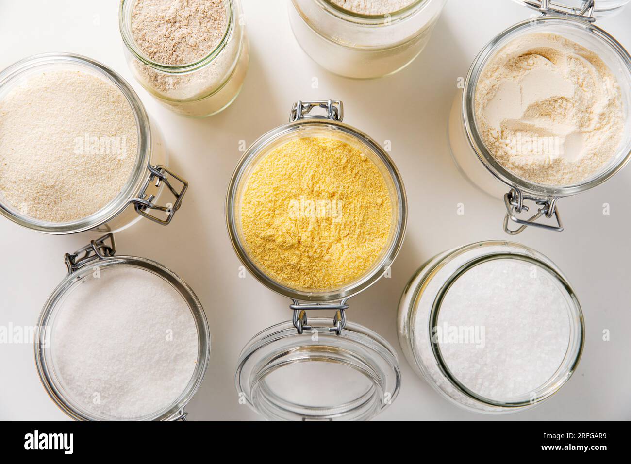 food storage, culinary and eating concept - close up of jars with ...