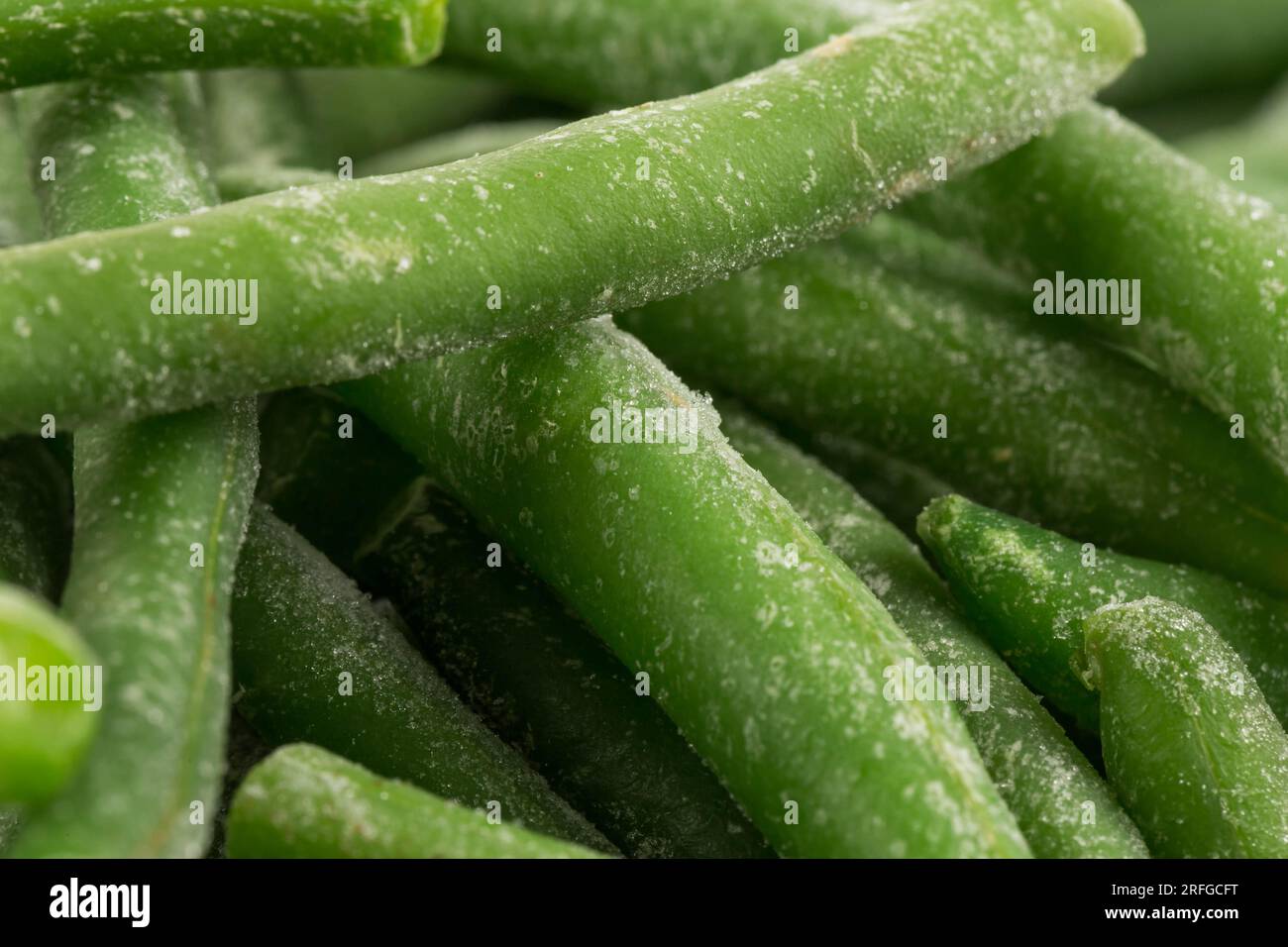 Frozen cut green beans vegetable in a bowl, isolated on white Stock ...