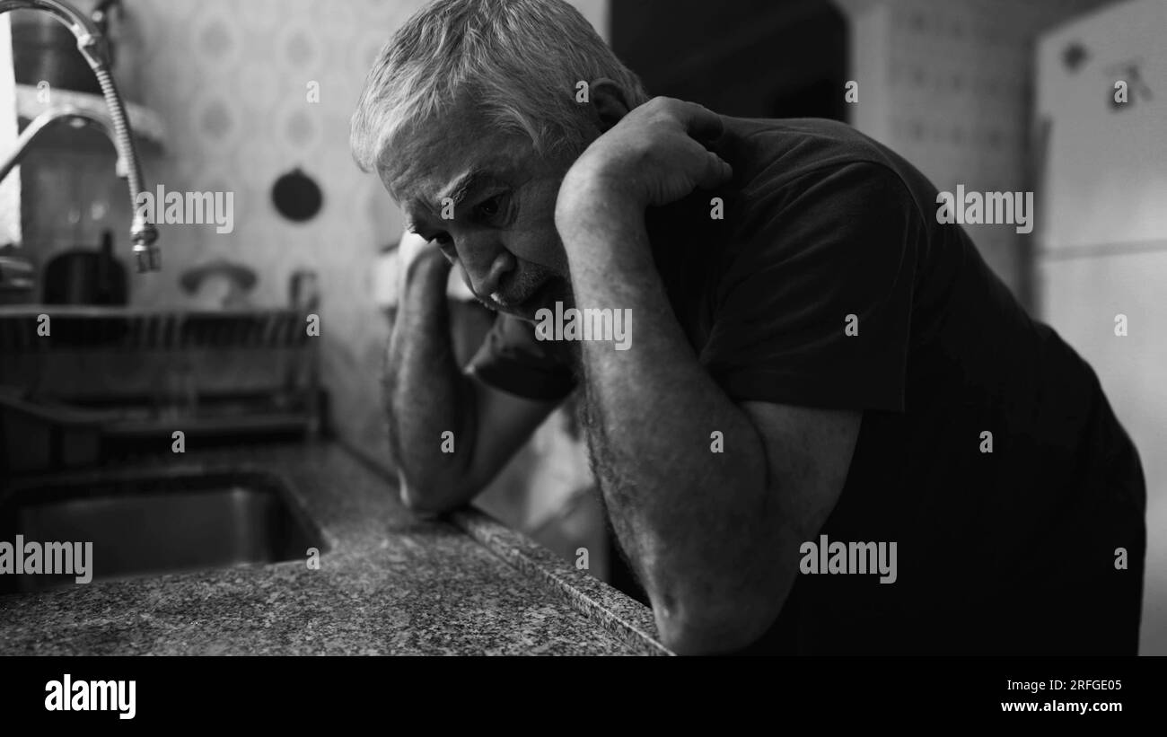 Dramatic senior in despair struggling with mental illness at home in ...