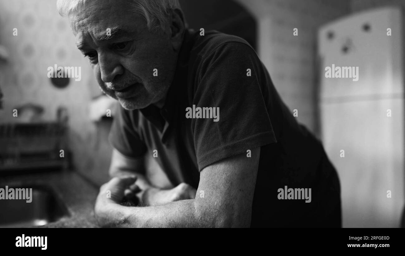 Dramatic senior in despair struggling with mental illness at home in ...