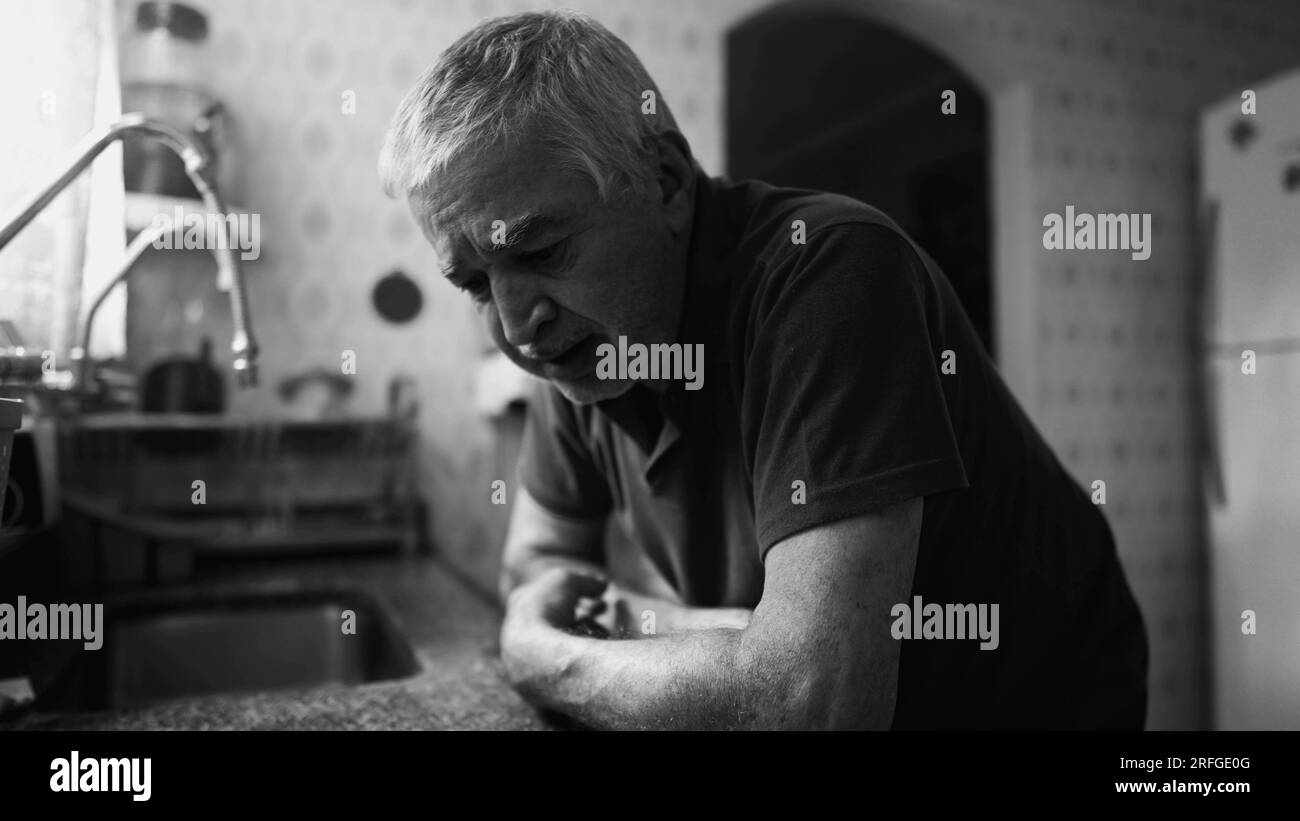 Dramatic senior in despair struggling with mental illness at home in ...