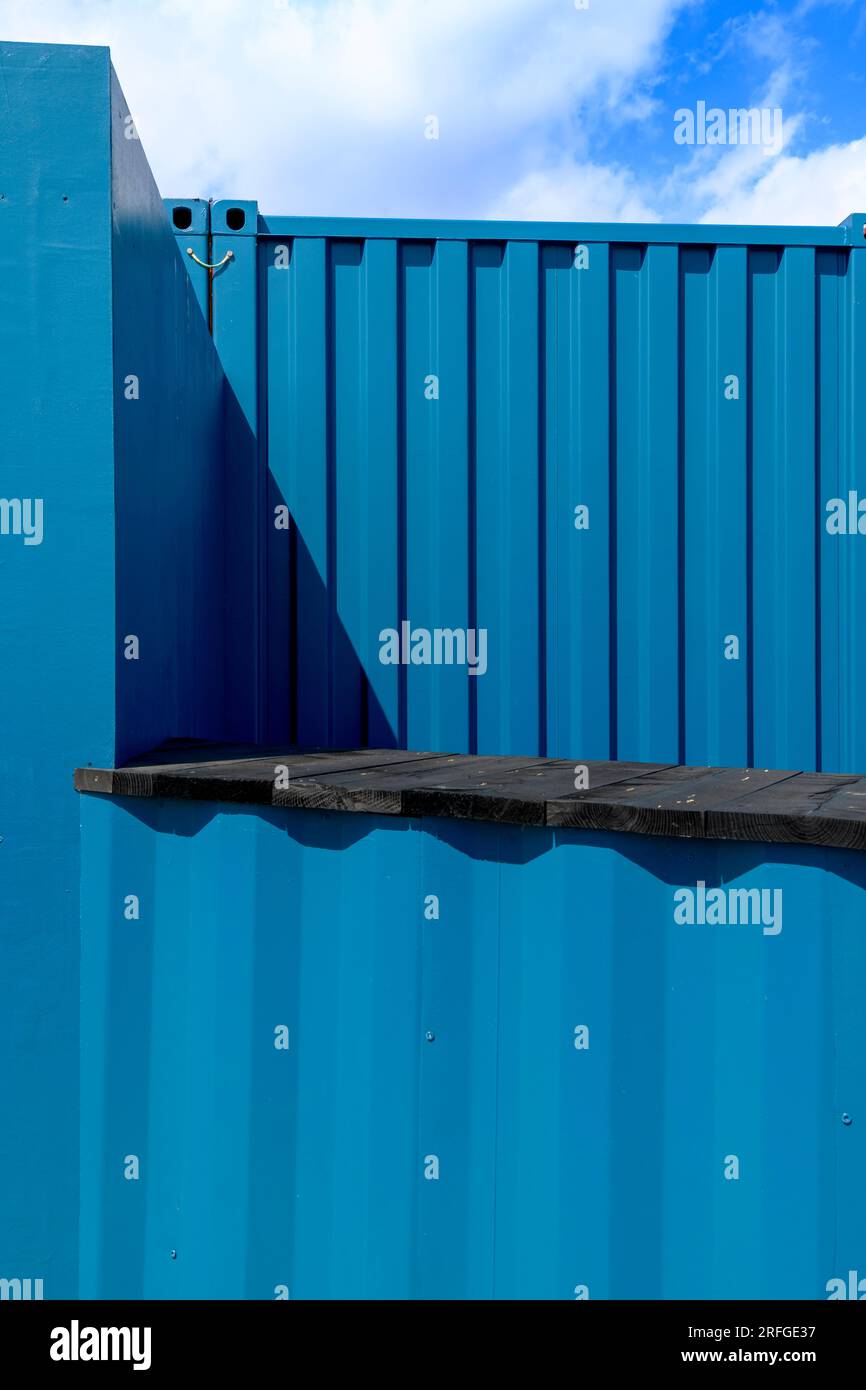 Colourful shipping containers used as cafes and bars on the Harbour Arm ...