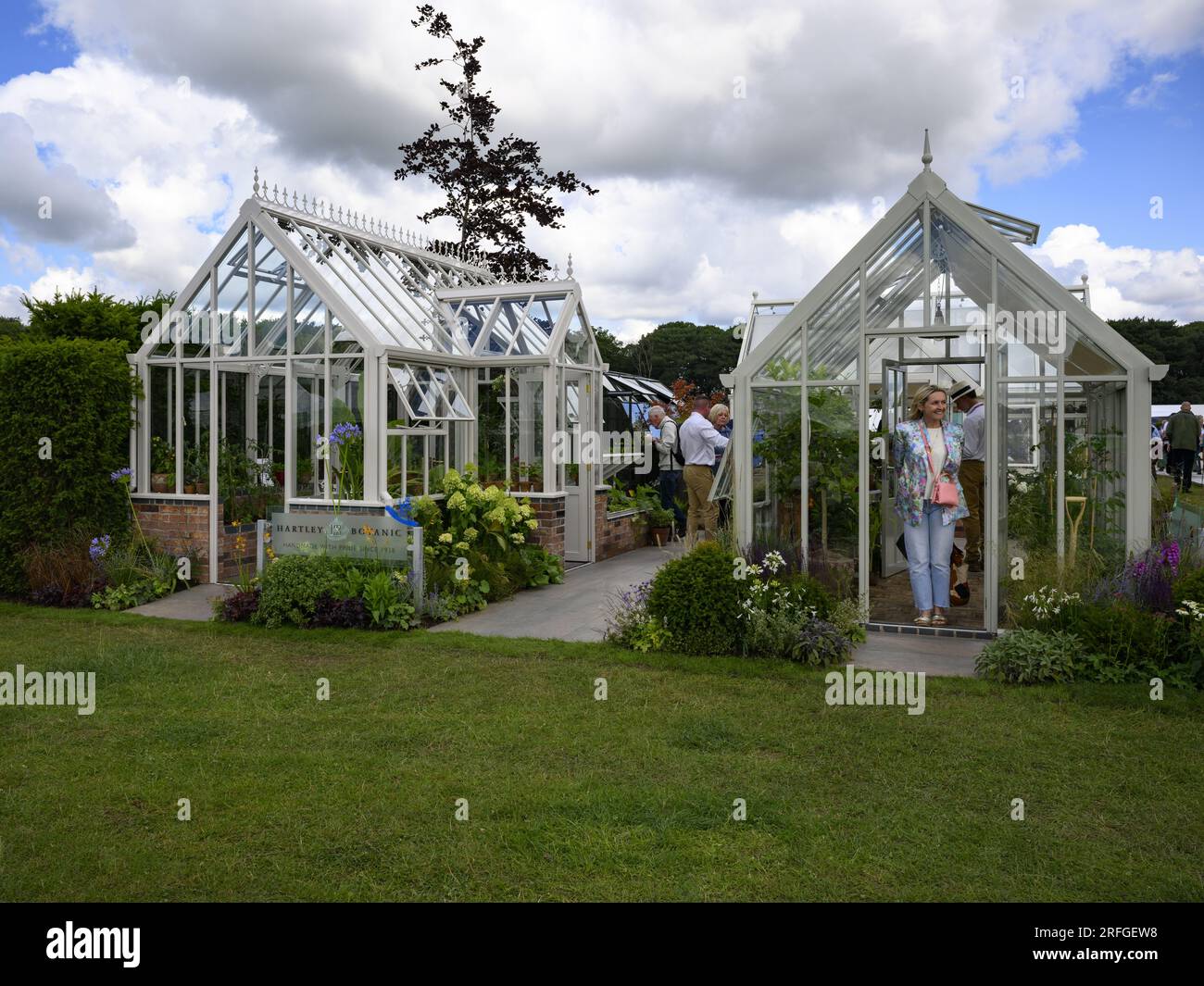 Visitors by greenhouses for sale on exhibitor's award-winning 'Feel ...
