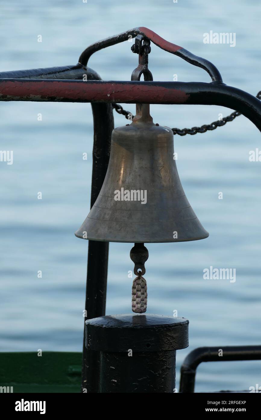 Ship's bell against the background of the sea Stock Photo - Alamy