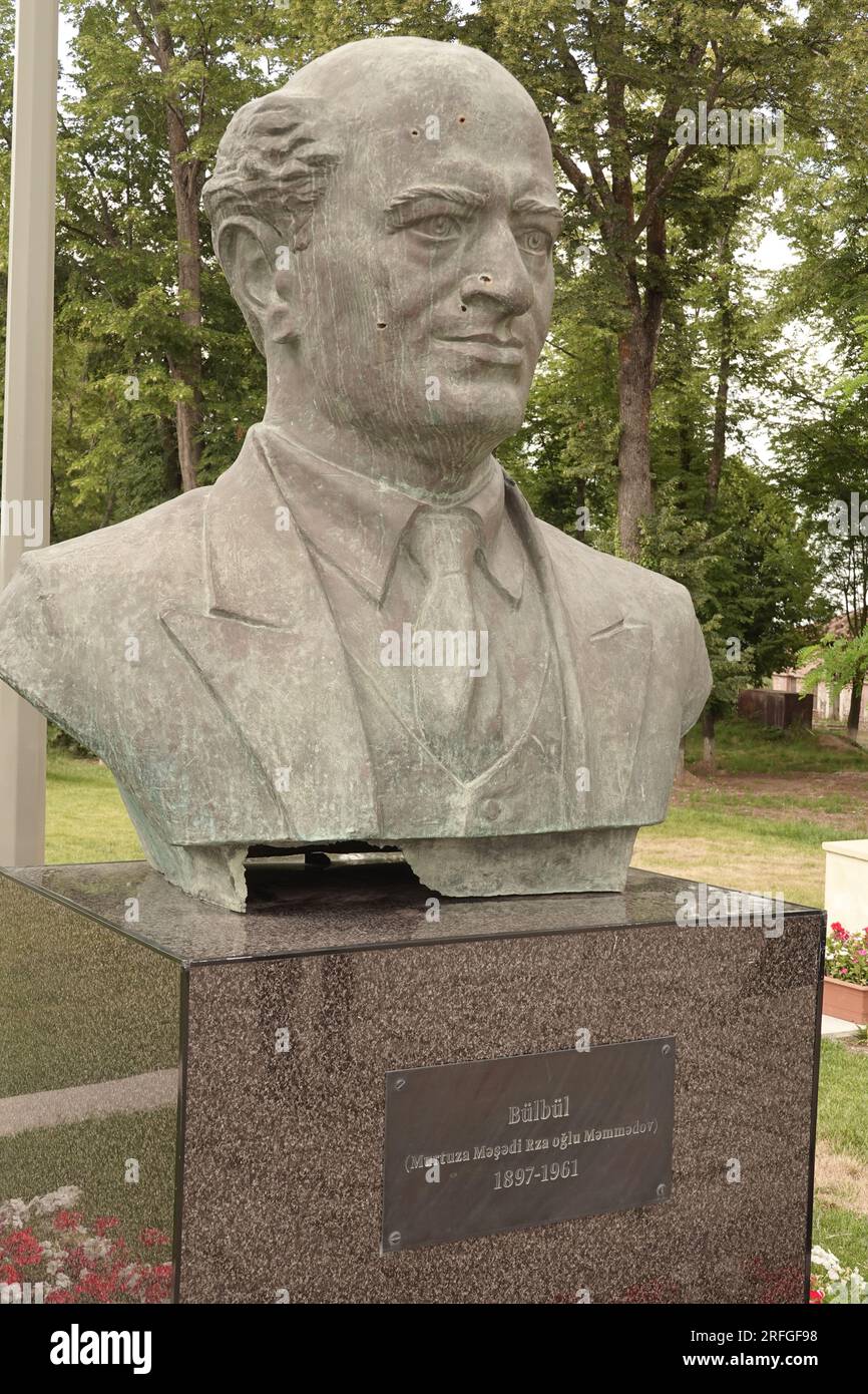 A bust of the famous Azerbaijani opera singer Bulbul with bullet holes ...