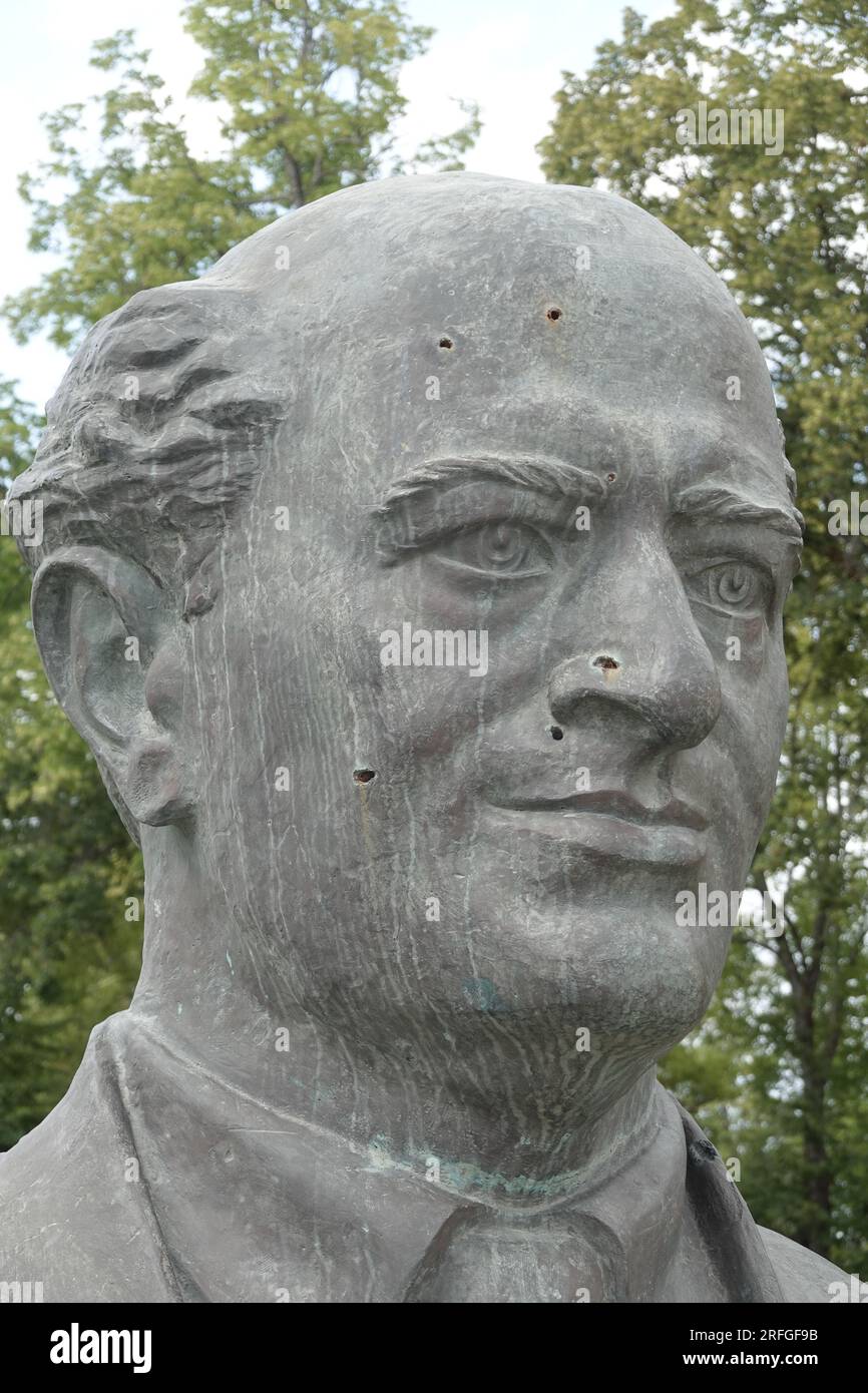 A bust of the famous Azerbaijani opera singer Bulbul with bullet holes ...