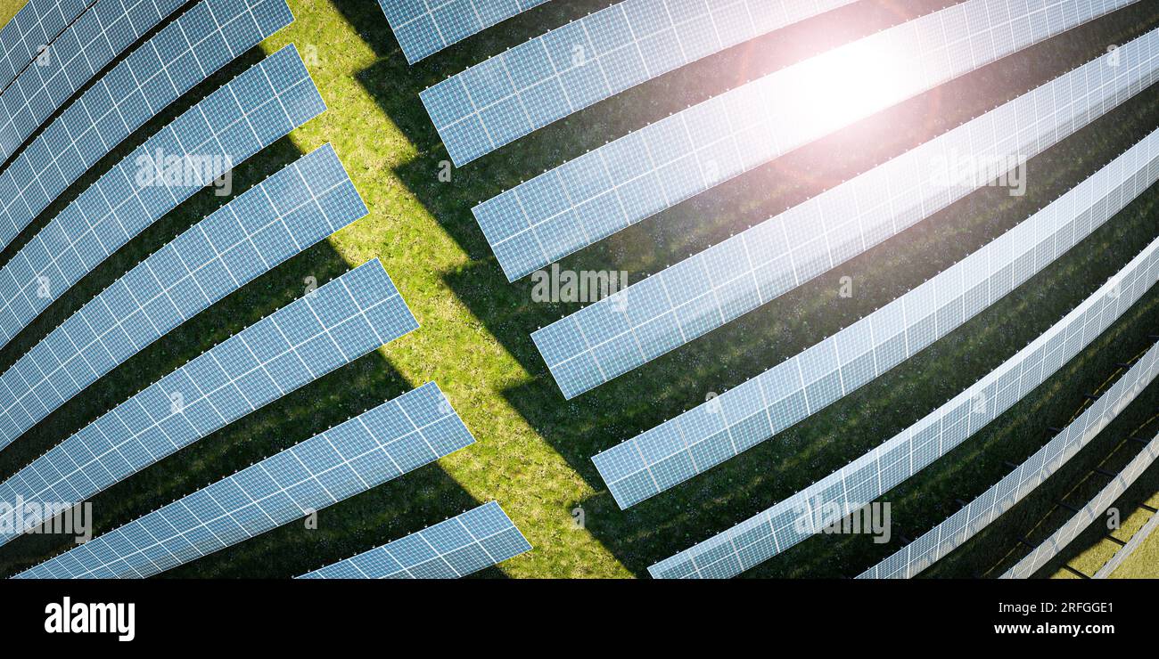 Solar farm of photovoltaic panels on a beautiful green meadow with wind ...