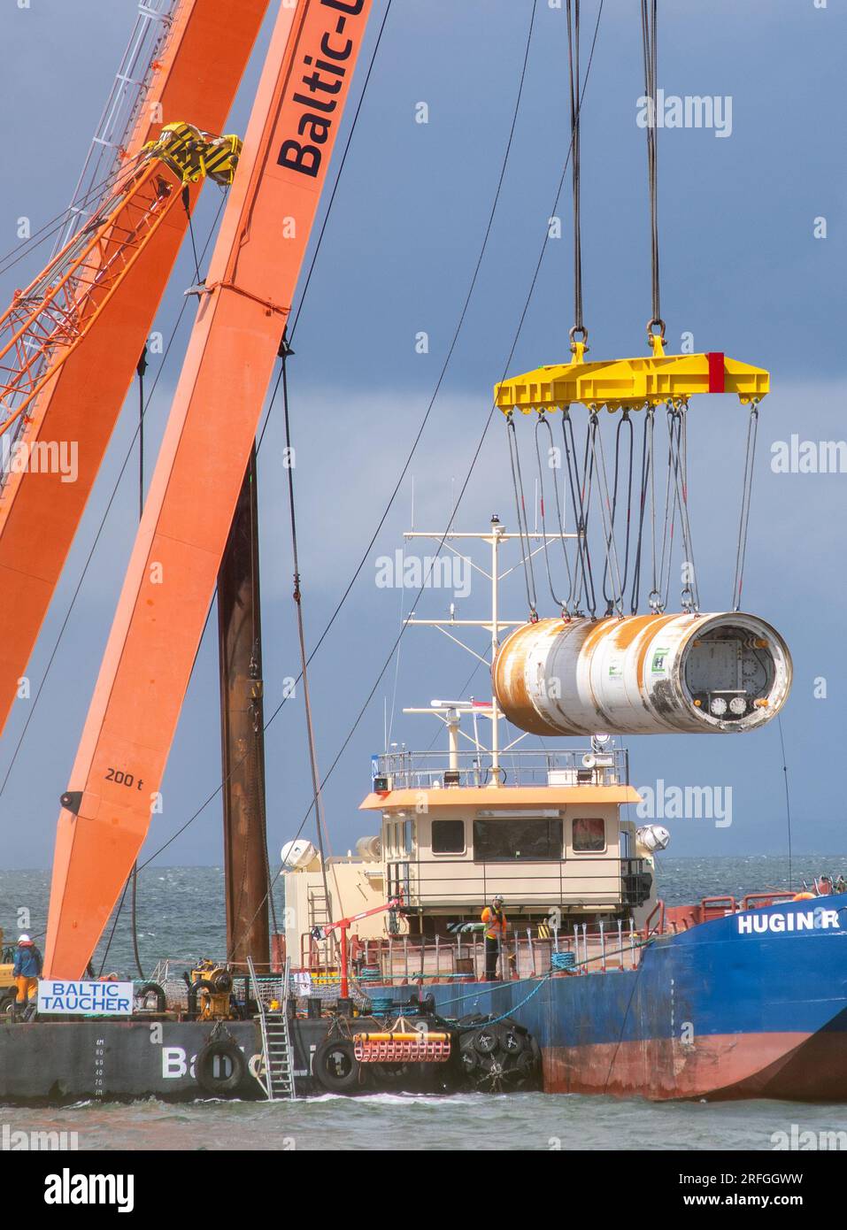 03 August 2023, Mecklenburg-Western Pomerania, Lubmin: The crane ship ...
