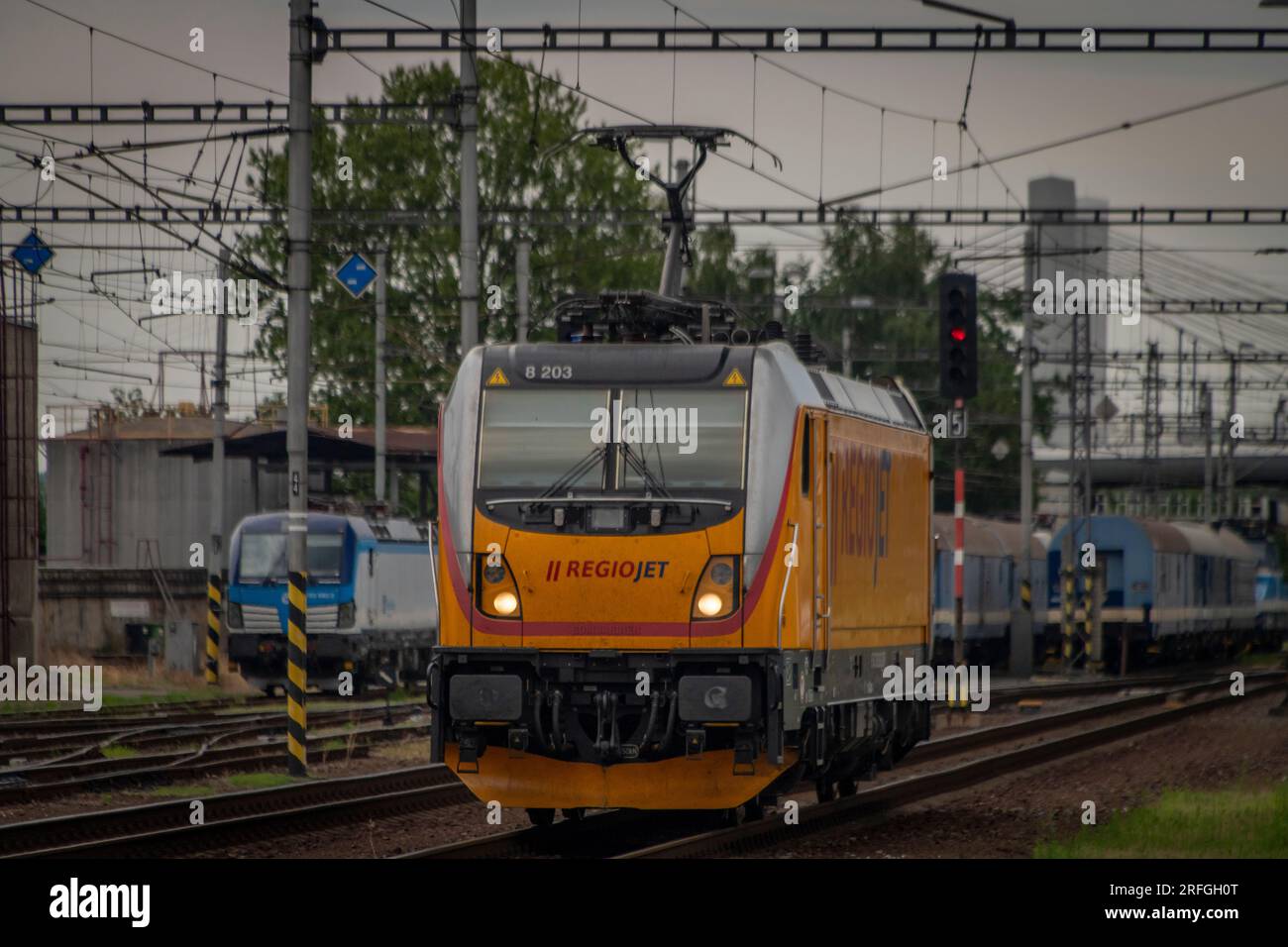 Trains in color summer cloudy hot evening in Bohumin CZ 07 21 2023 ...