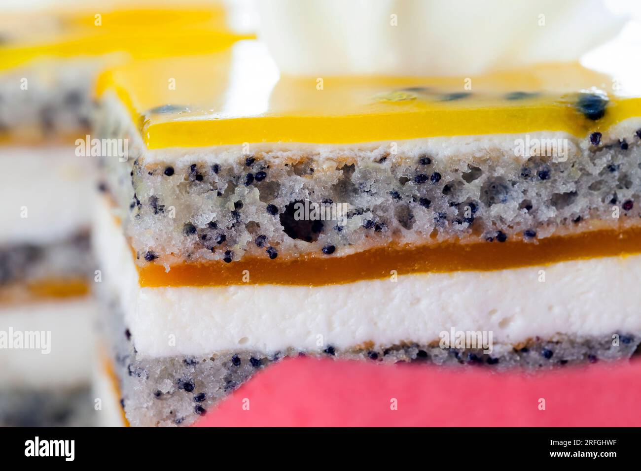 multi layered sponge cake with poppy seeds, mango fruit filling and ...