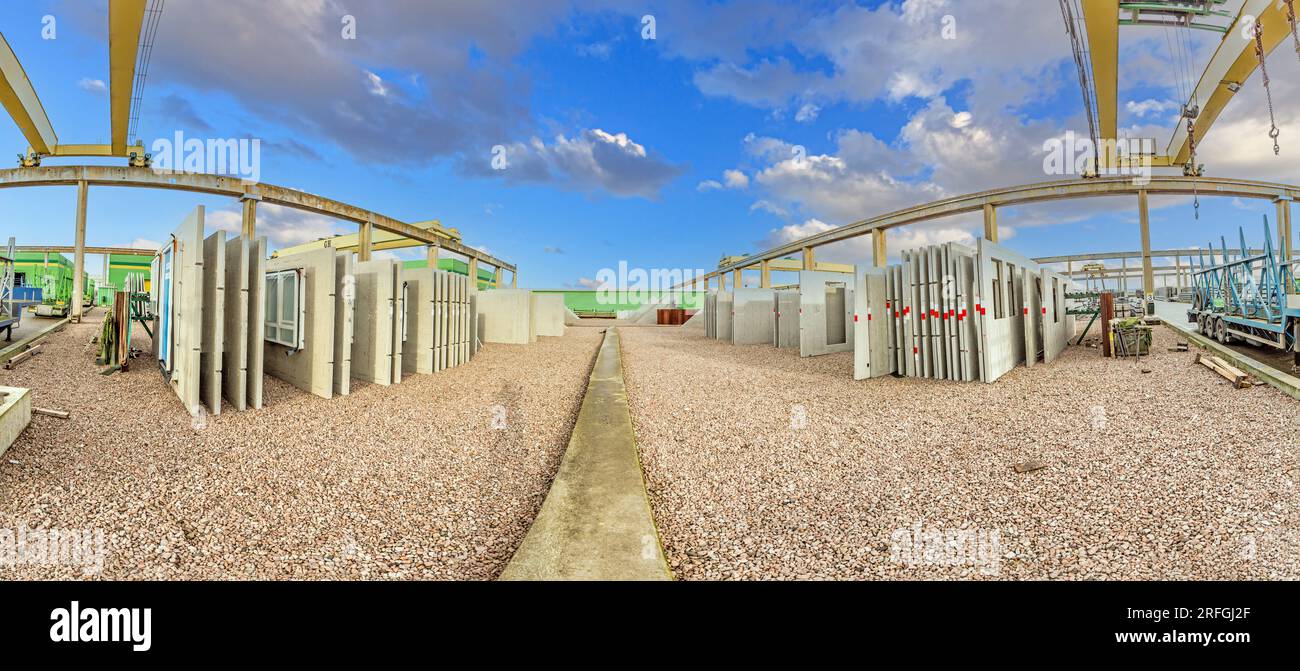 Panoramic view over an element warehouse in a precast concrete plant ...
