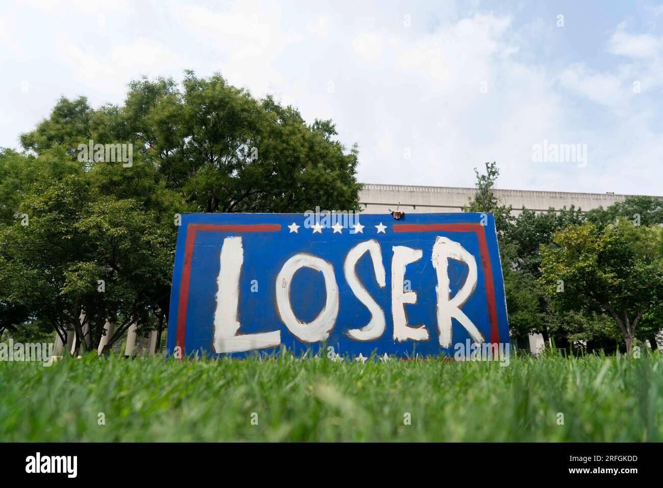 Washington, United States. 03rd Aug, 2023. A demonstrator holds a ...