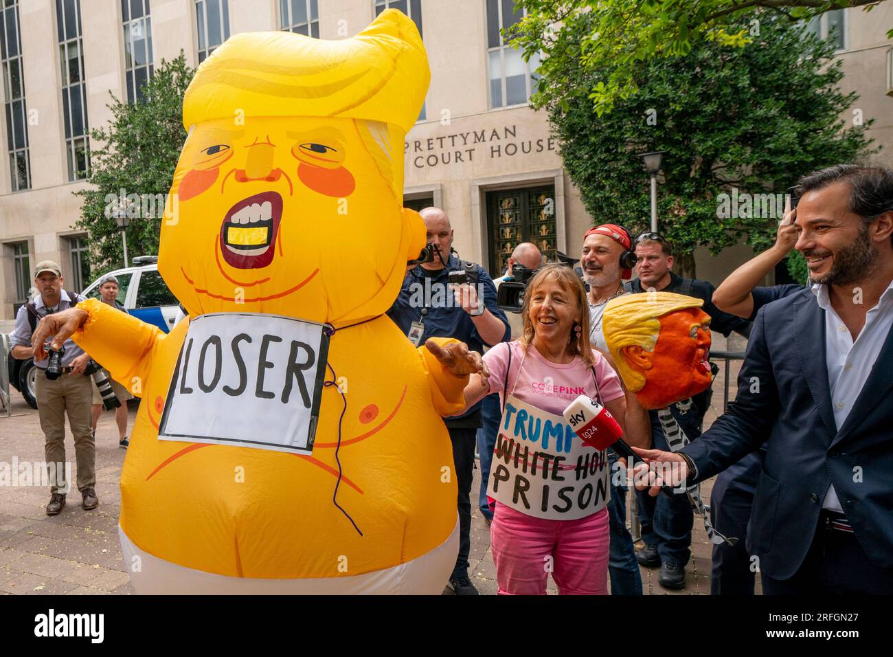 Washington, United States. 03rd Aug, 2023. A protester wearing an ...