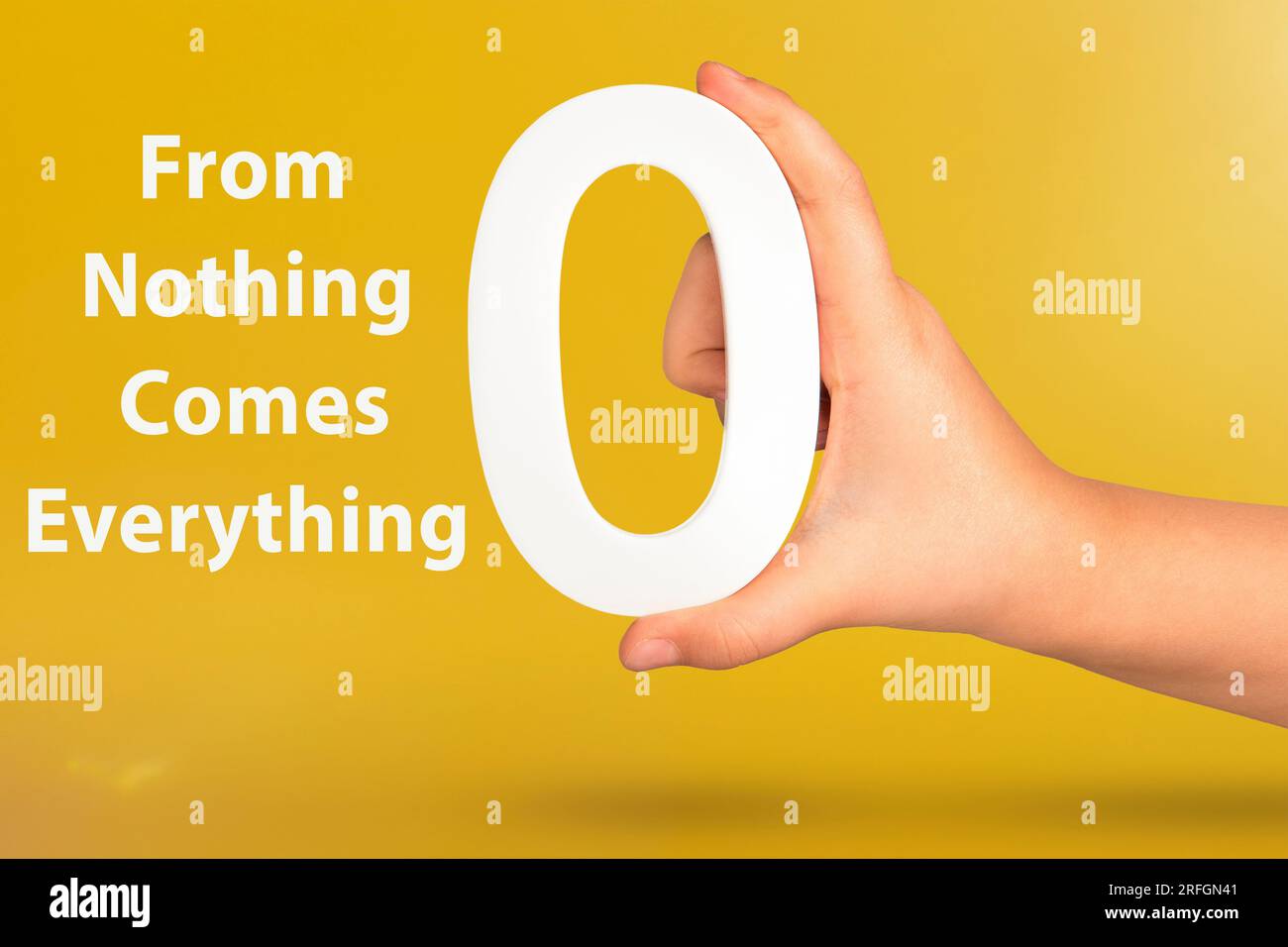 From Nothing Comes Everything. Close-up concept photo of a hand holding ...