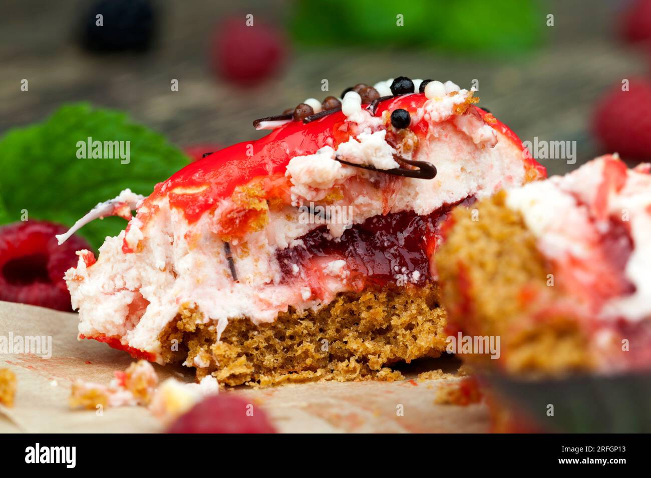 fresh cake with red raspberry jam, sweet cake with berry filling of red ...