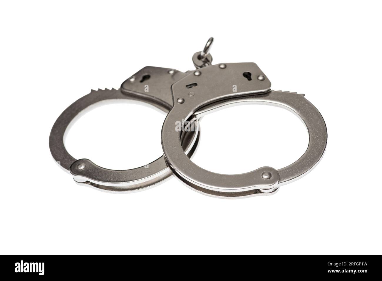 Pair of steel handcuffs isolated on white background Stock Photo - Alamy
