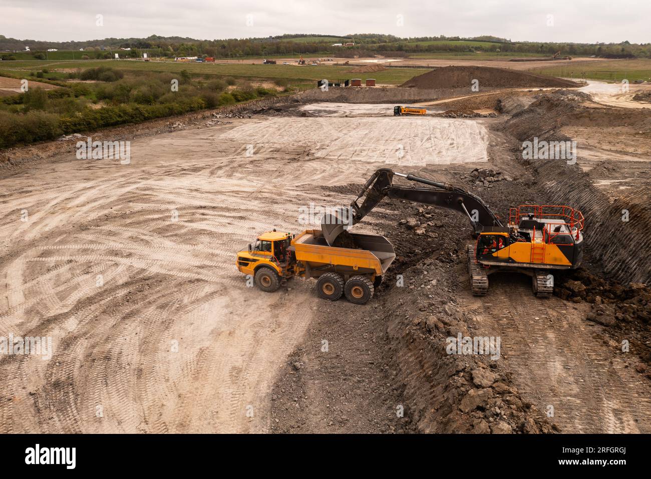Aerial view directly above a crane or mechanical digger with grab ...