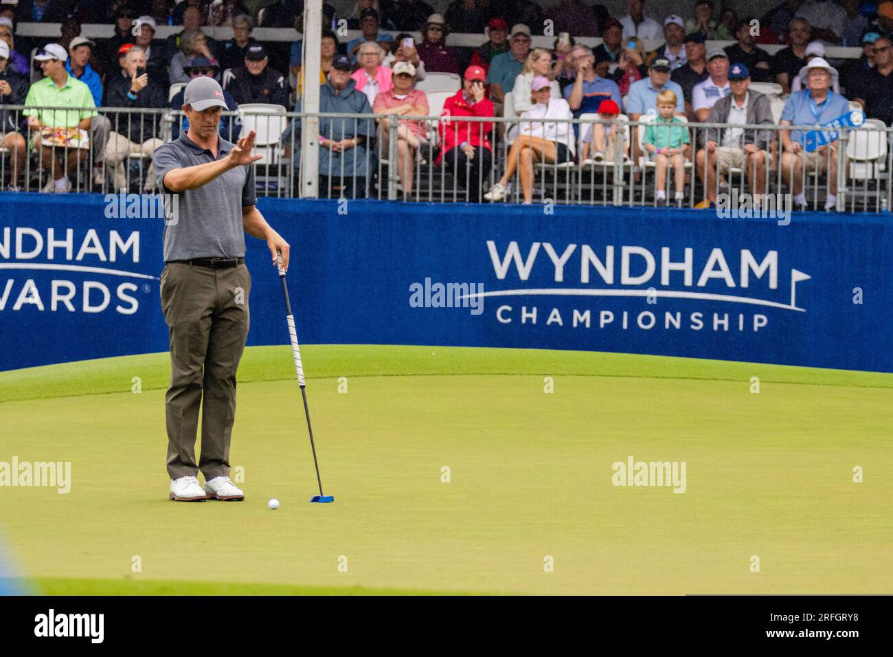 August 3, 2023: Adam Scott lines up his putt on the ninth green during ...