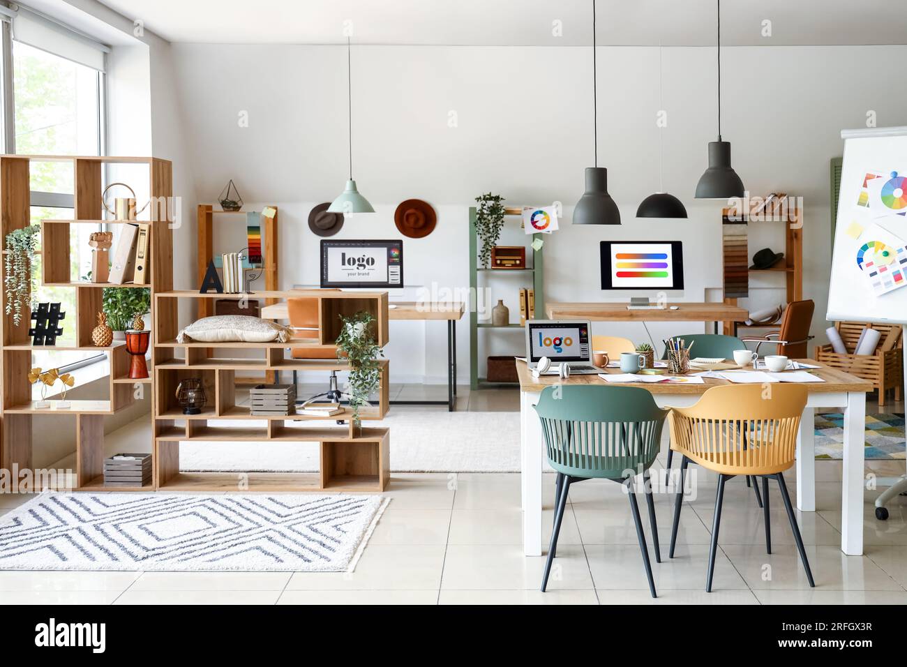 Interior of office with graphic designer's workplaces Stock Photo - Alamy