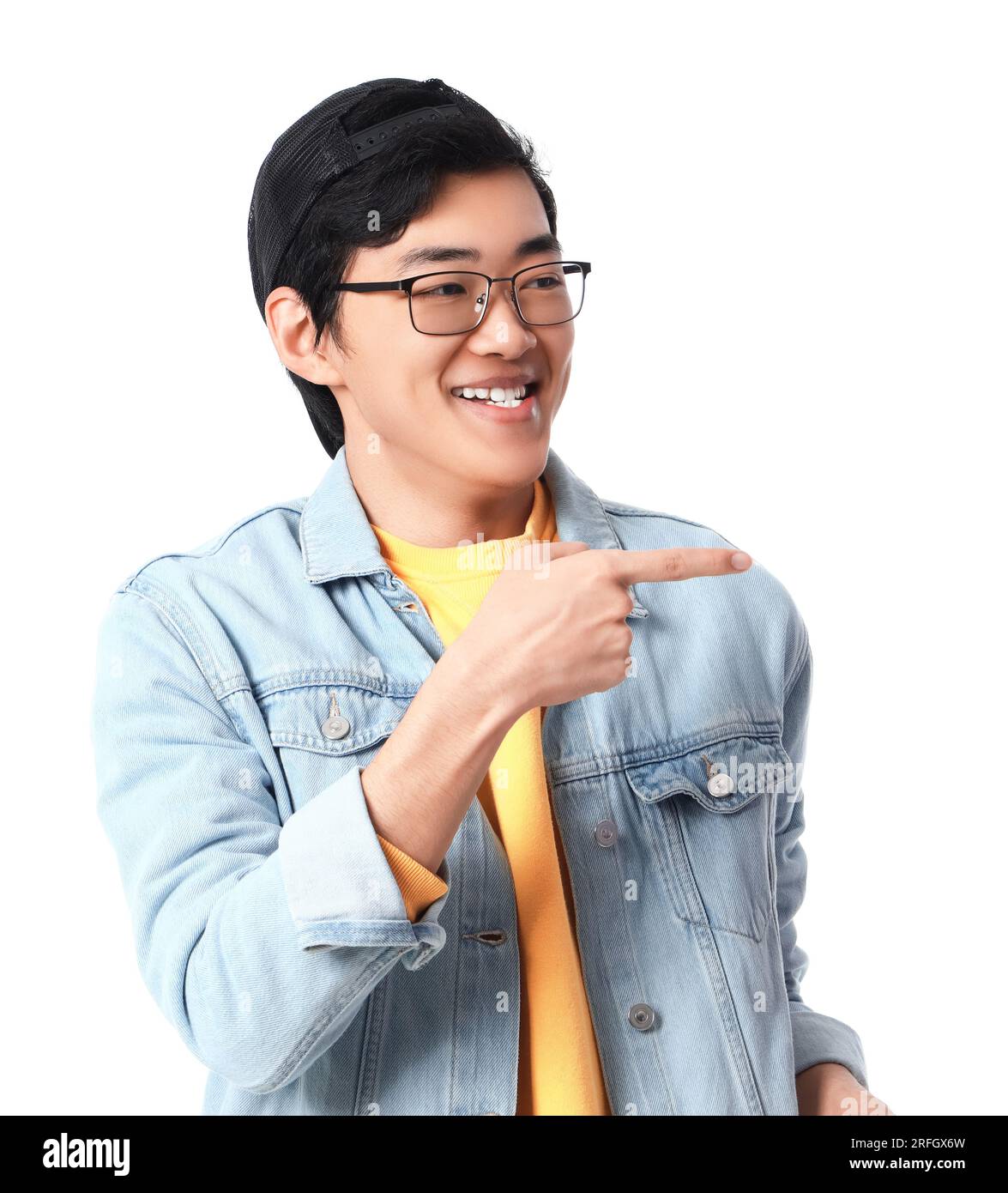 Young Asian man pointing at something on white background Stock Photo ...