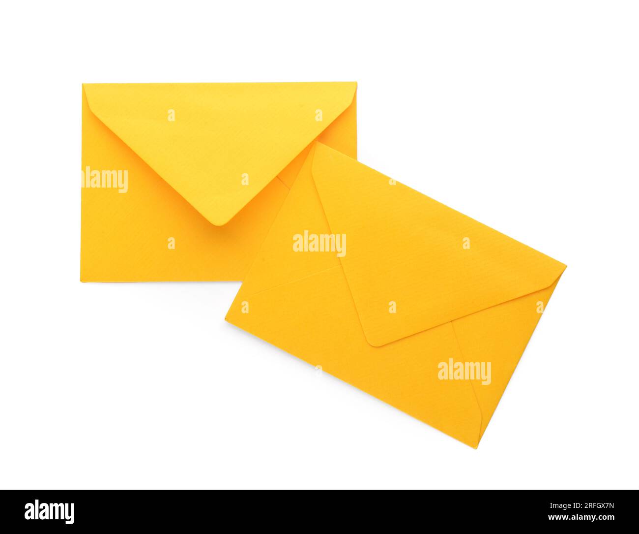Yellow envelopes isolated on white background Stock Photo - Alamy