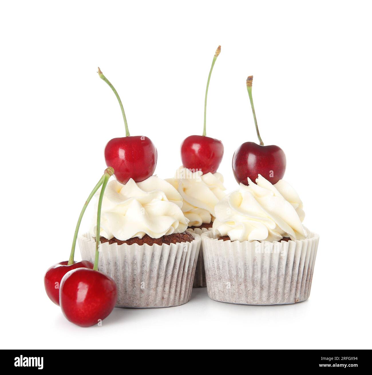 Tasty cherry cupcakes on white background Stock Photo - Alamy