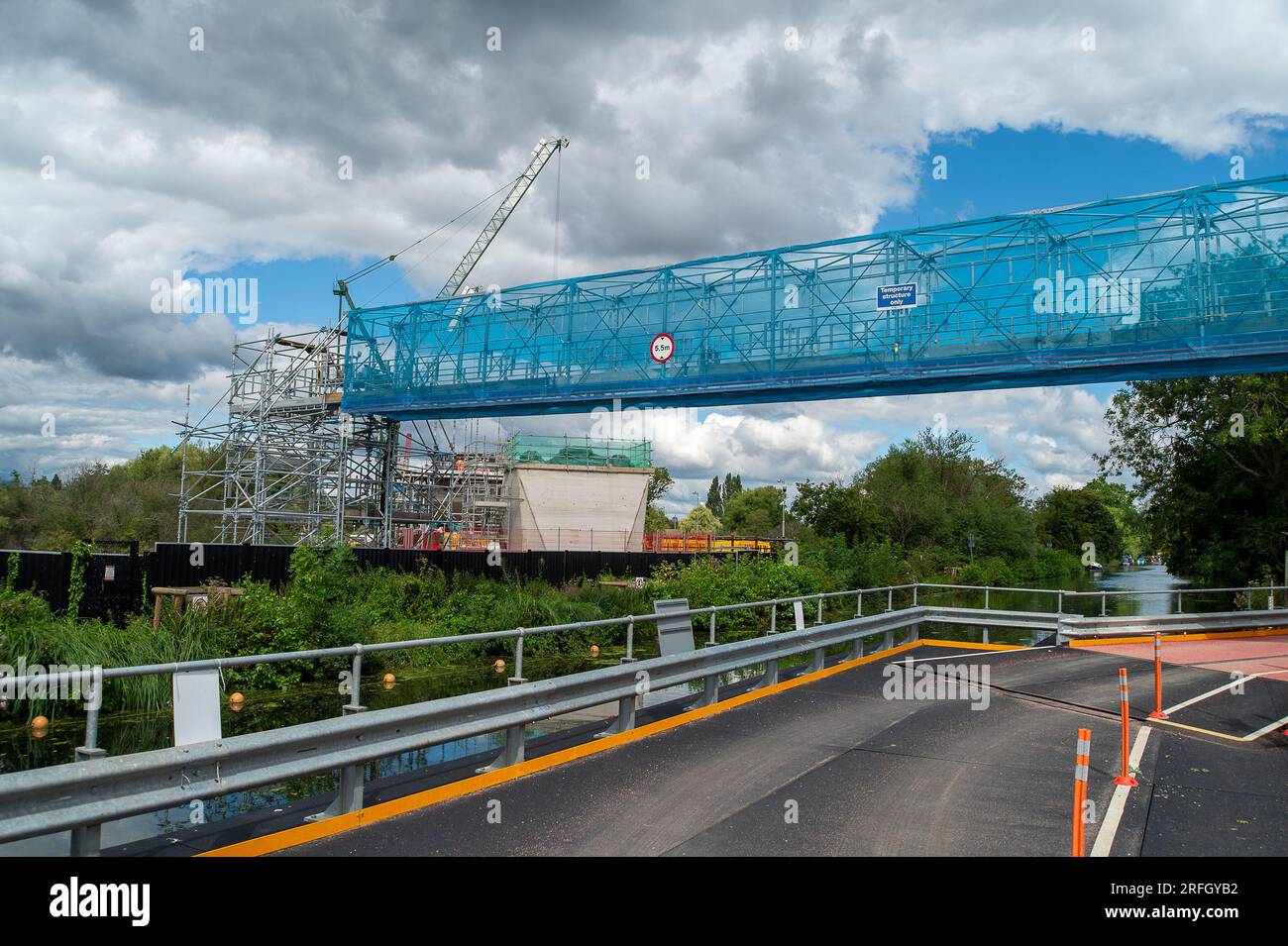Harefield, UK. 3rd August, 2023. A temporary HS2 pipeline and overhead walkway for HS2 ...